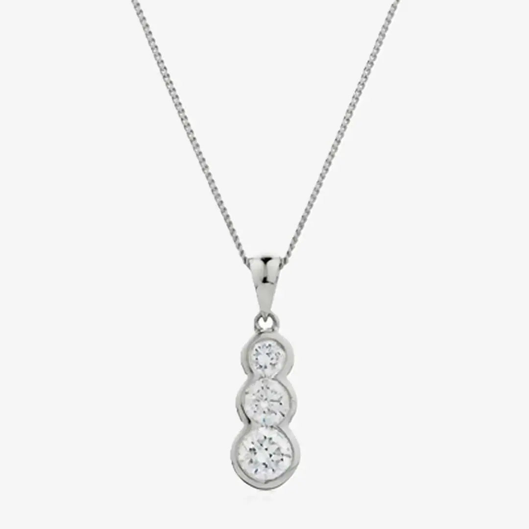 solitaire | Round cut solitaire in three stone rub over setting – HEERA ...